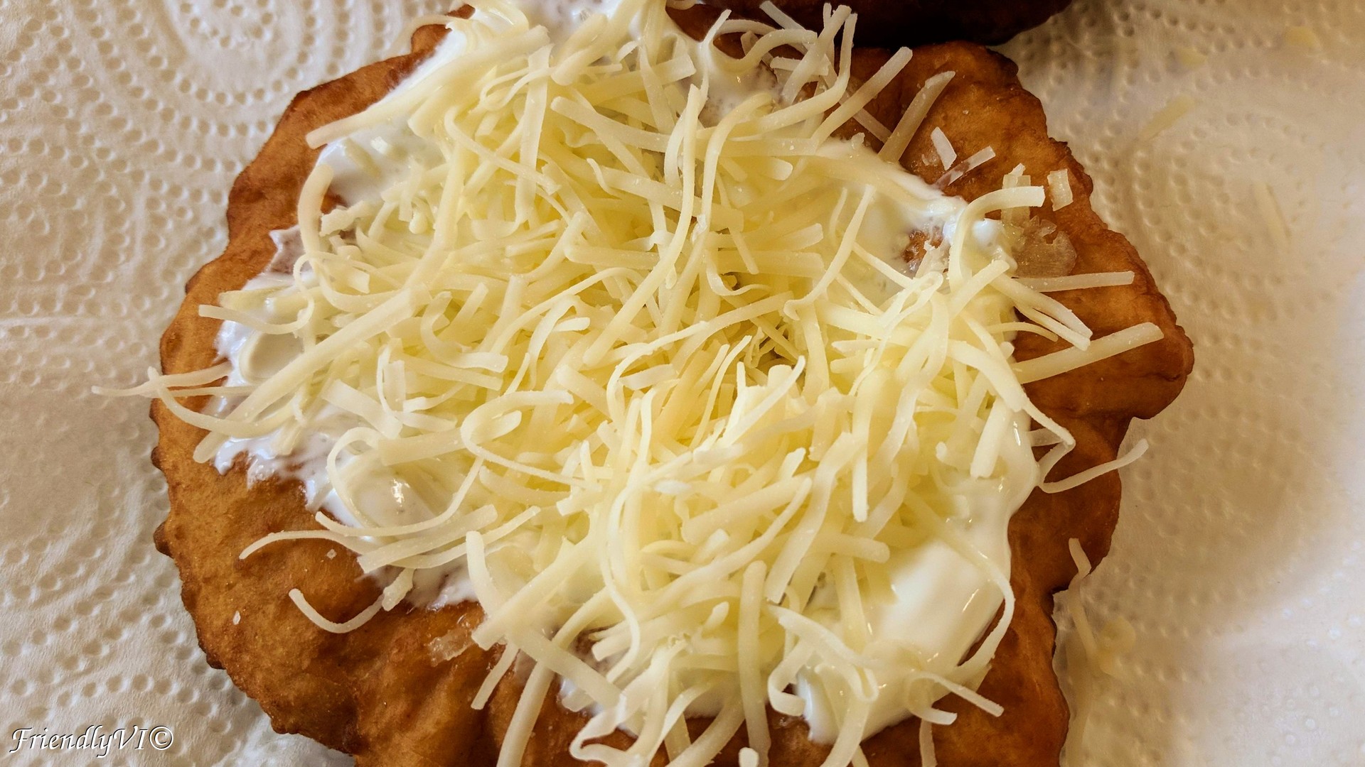 Traditional Hungarian lángos - Thyme consuming